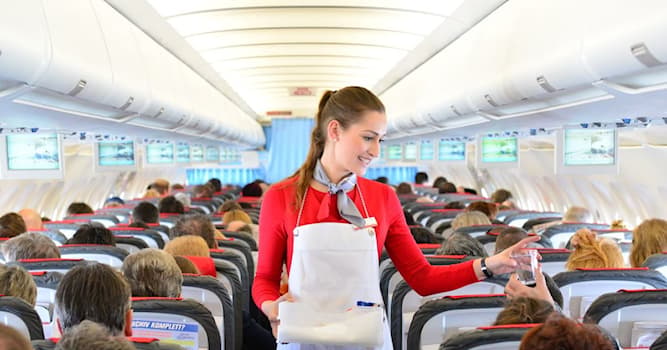 Why do cabin crew stand with their... | Trivia Questions | QuizzClub